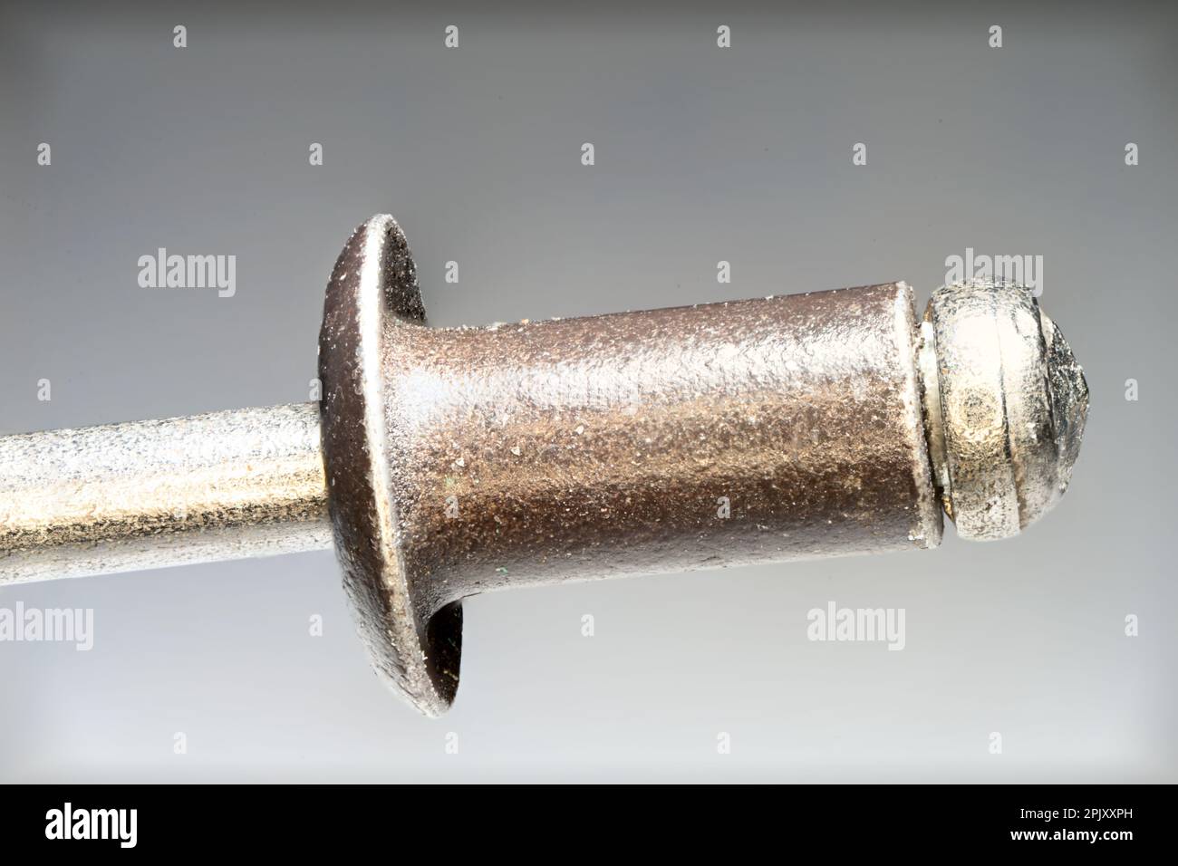 Extreme close up of not yet processed iron steel sheet metal blind ...