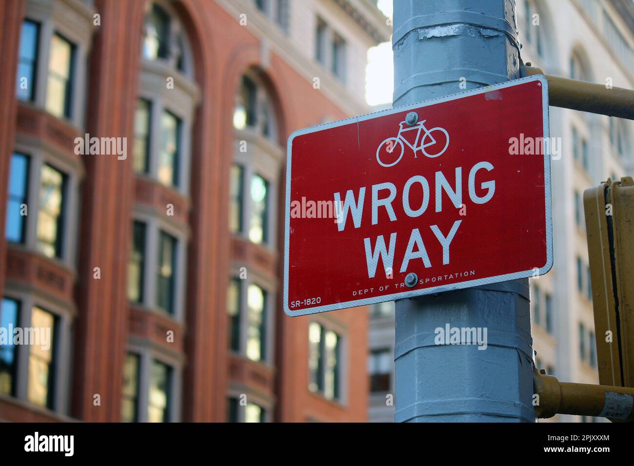 Red Wrong Way for bicycle direction traffic sign in Manhattan Stock ...