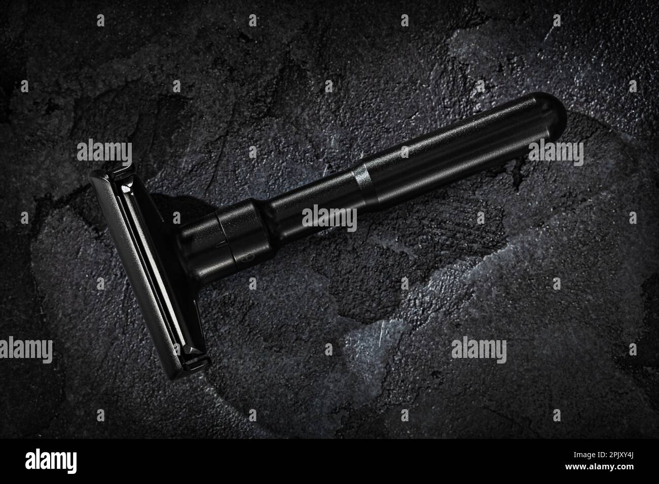Black Safety Razor Barber Tool On Stone Slate Background Stock Photo ...