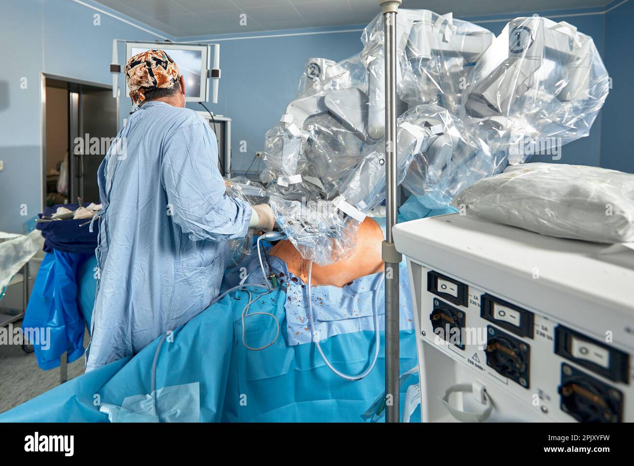 Surgical system with minimally invasive robot in a hospital. Robotic ...