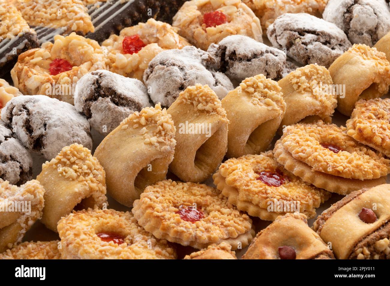 Variation of traditional fresh baked Moroccan cookies full frame close ...