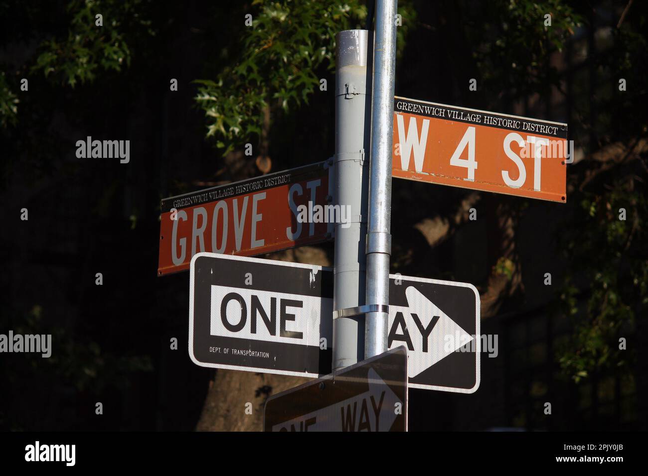 Brown West 4th Street and Grove Street historic sign in Midtown ...