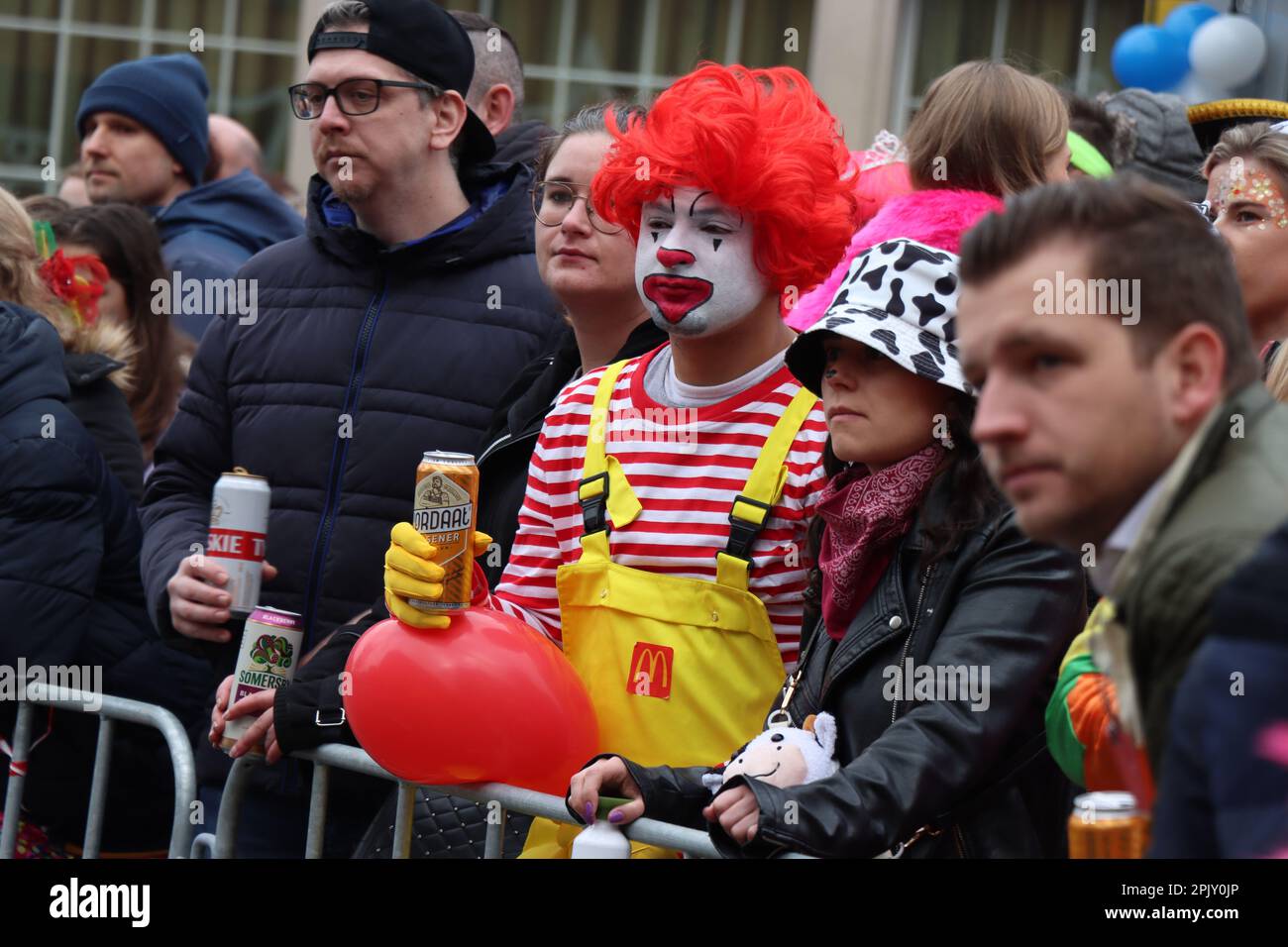 A group of Dutch citizens celebrating the Rogstaekers parade with a ...