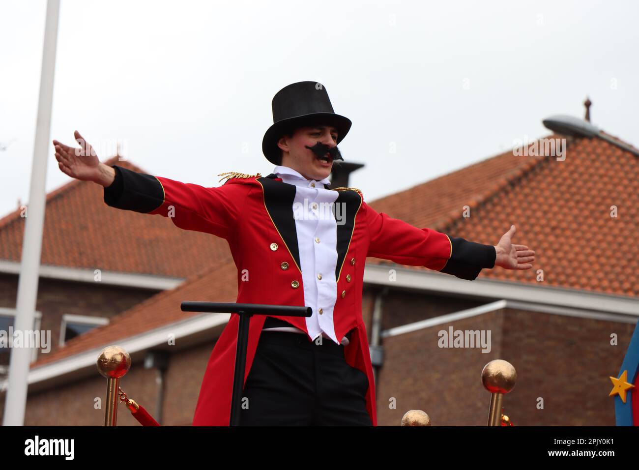 A group of Dutch citizens celebrating the Rogstaekers parade with a ...
