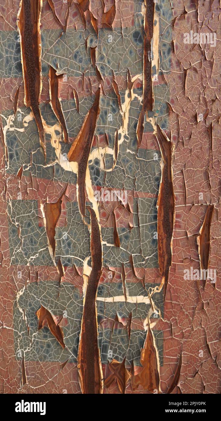close up abstract background of an old wall with painting peeling away ...