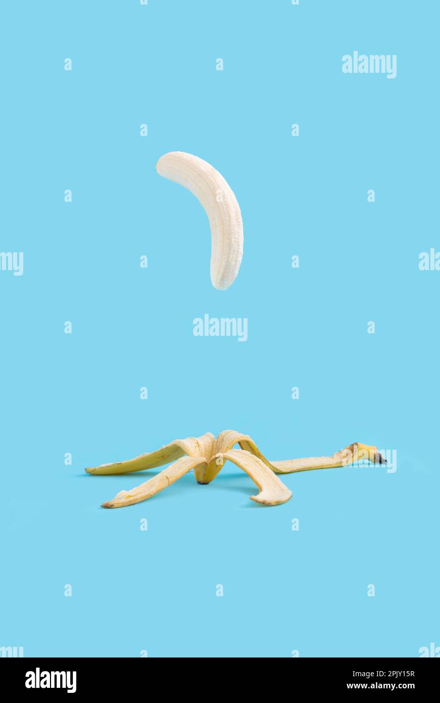 A vibrant image featuring a peeled banana flying in front of a pastel ...