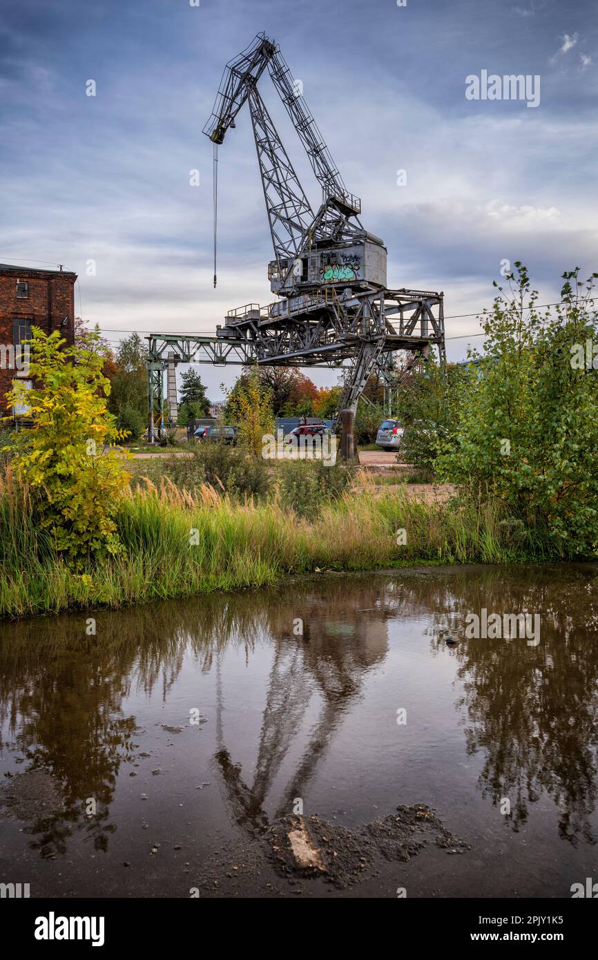 Old truss crane from 1937 with reflection in water, former Imperial ...