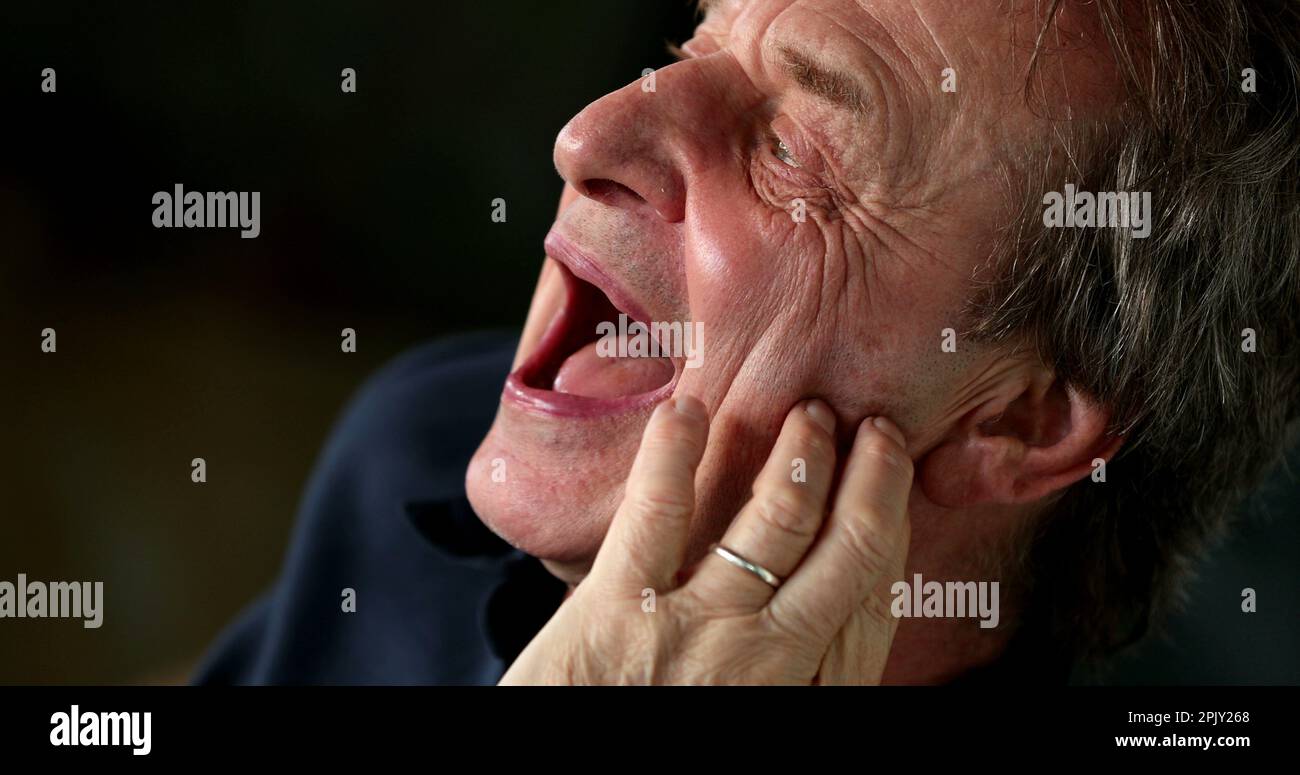 Pensive older man thinking. Contemplative senior person scratching face ...