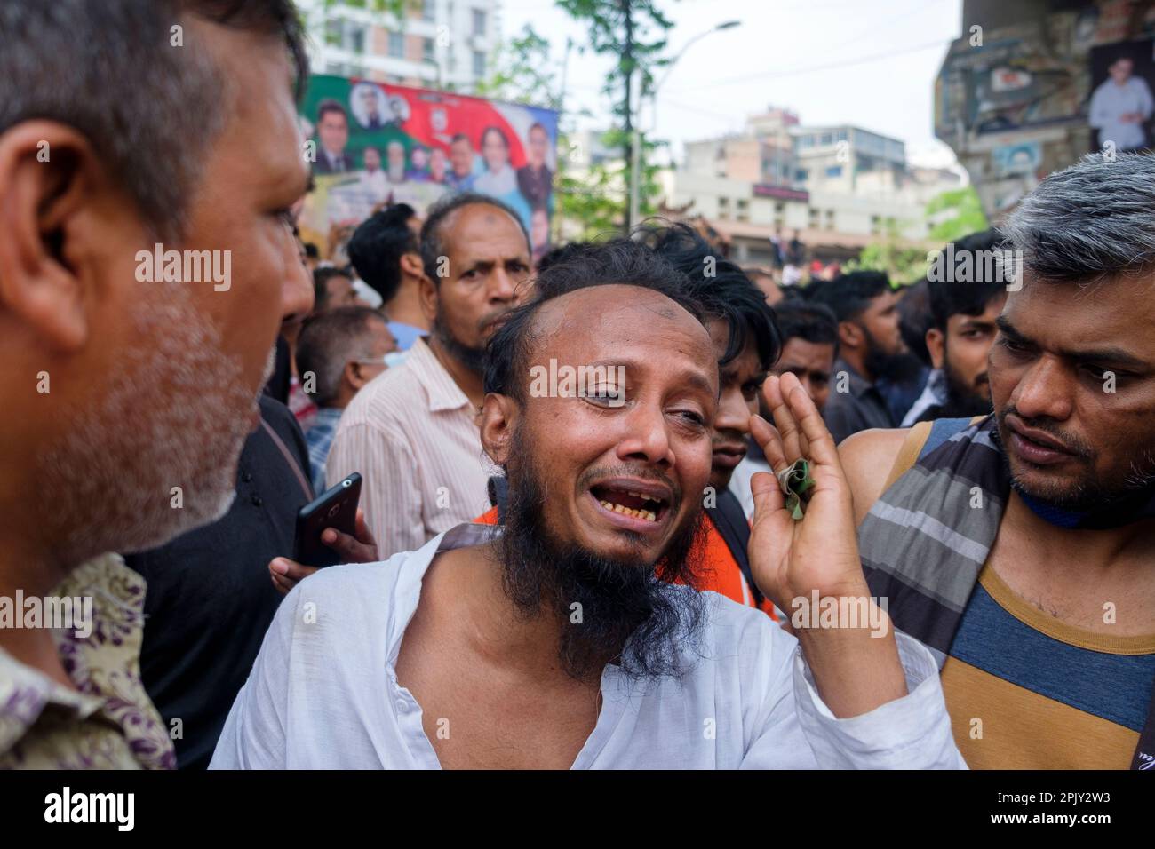 A shop owner breaks down crying as the market burns. On the dawn of ...