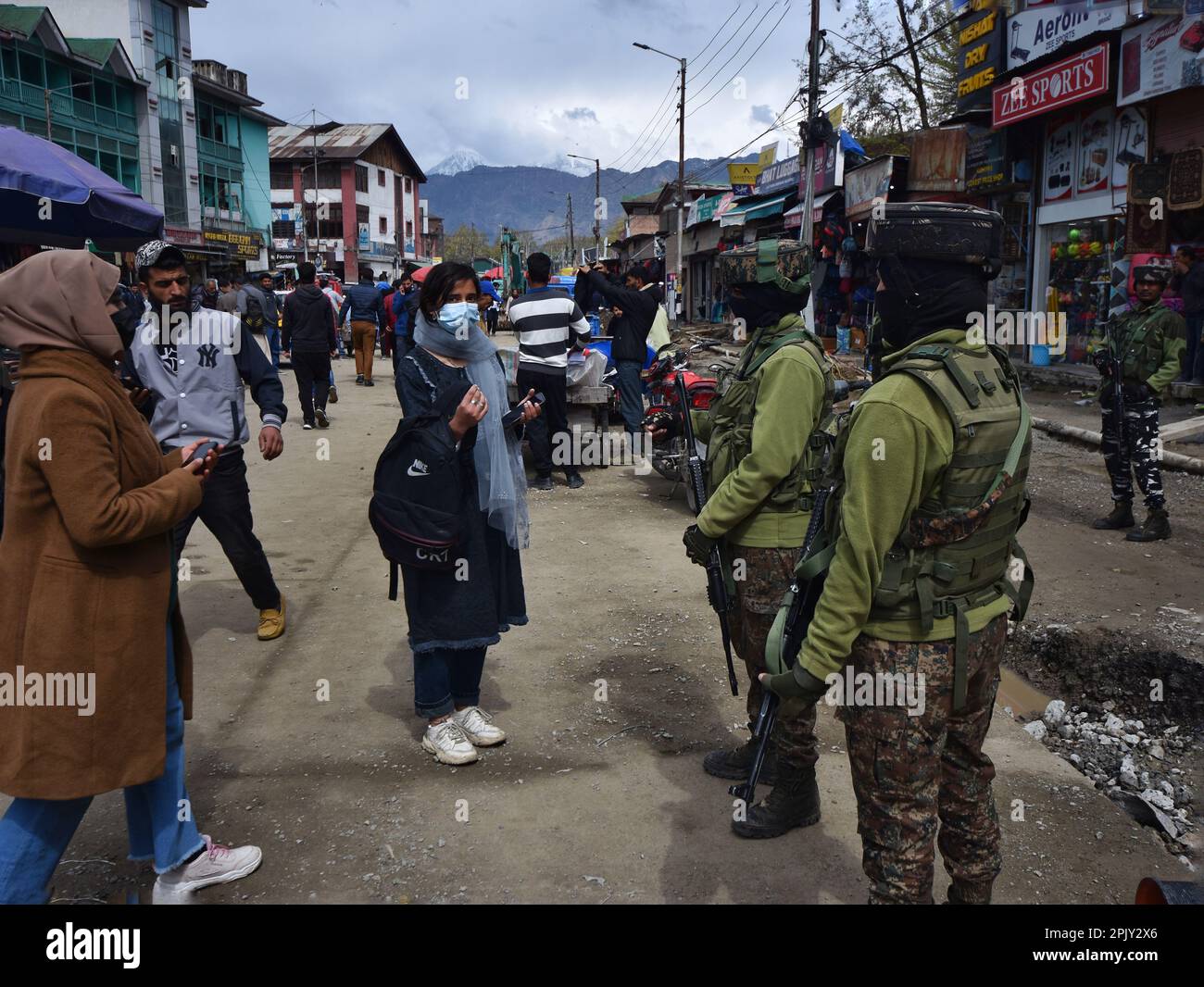 Srinagar, India. 04th Apr, 2023. A Kashmiri college Girl is being checked by female CRPF ...