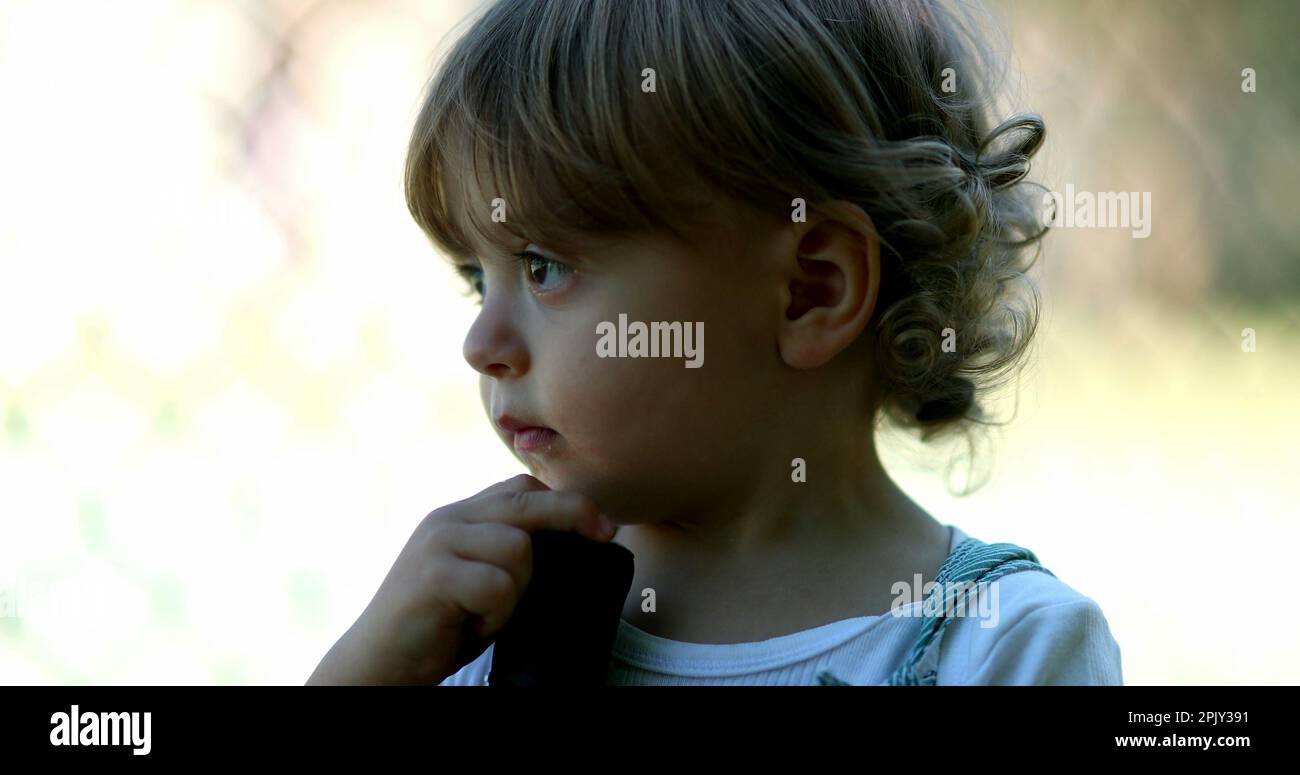 Contemplative little boy thinking. Portrait pensive child kid Stock ...