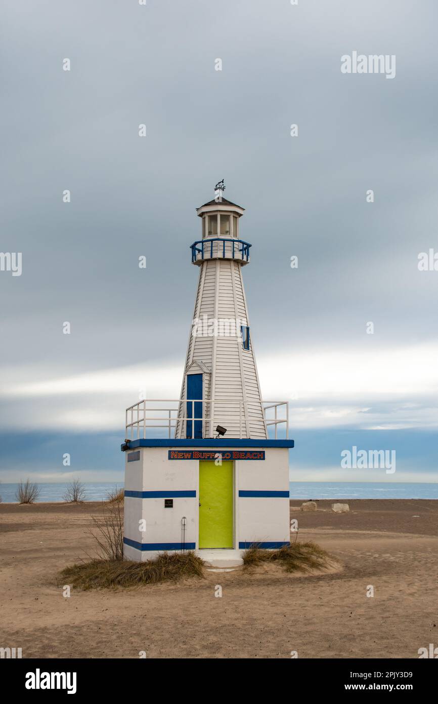 Lighthouse on the beach as storm clouds approach. New Buffalo, Michigan ...