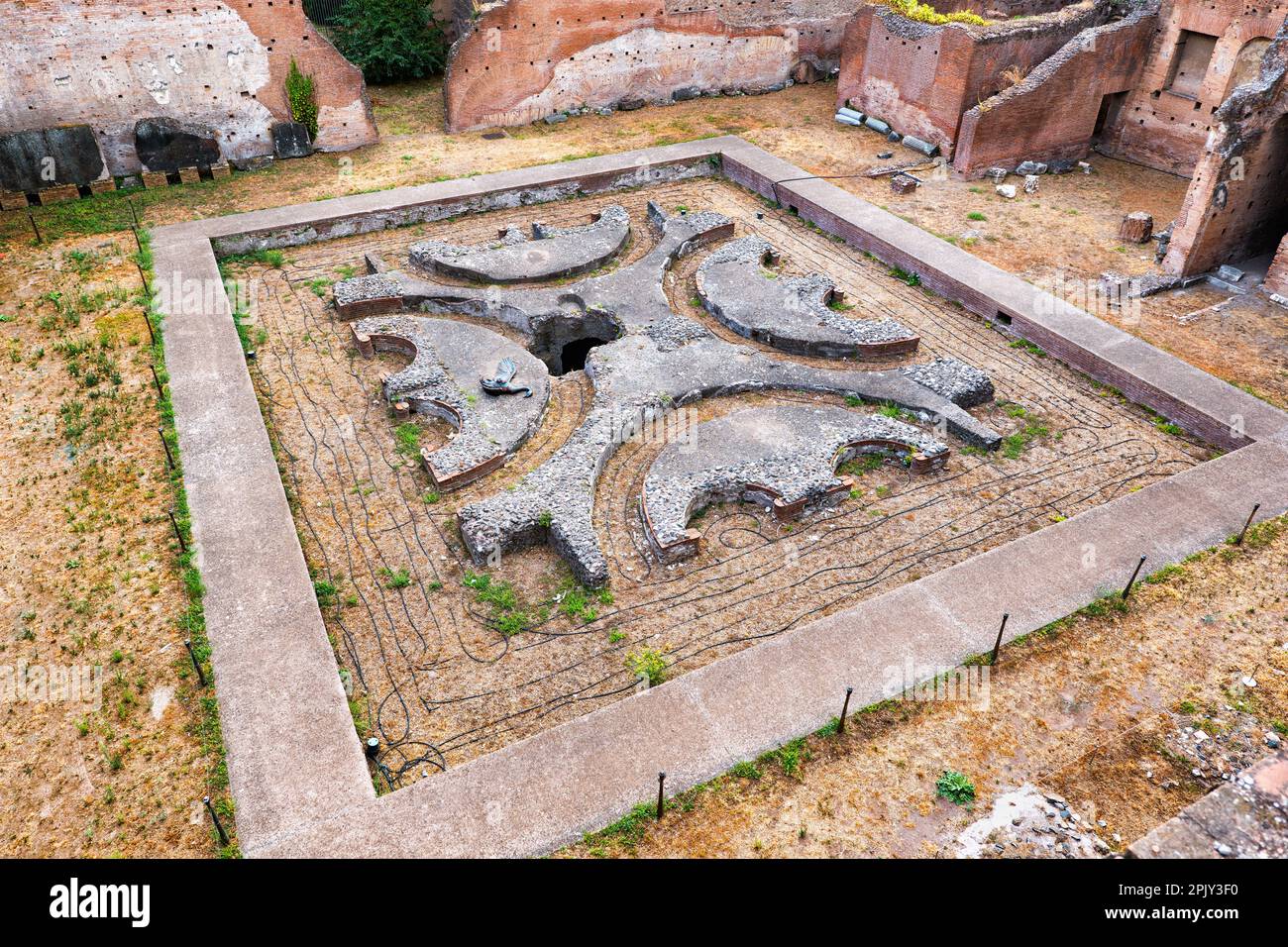 Fountain of Pelte ancient remains in open air courtyard of Domus ...