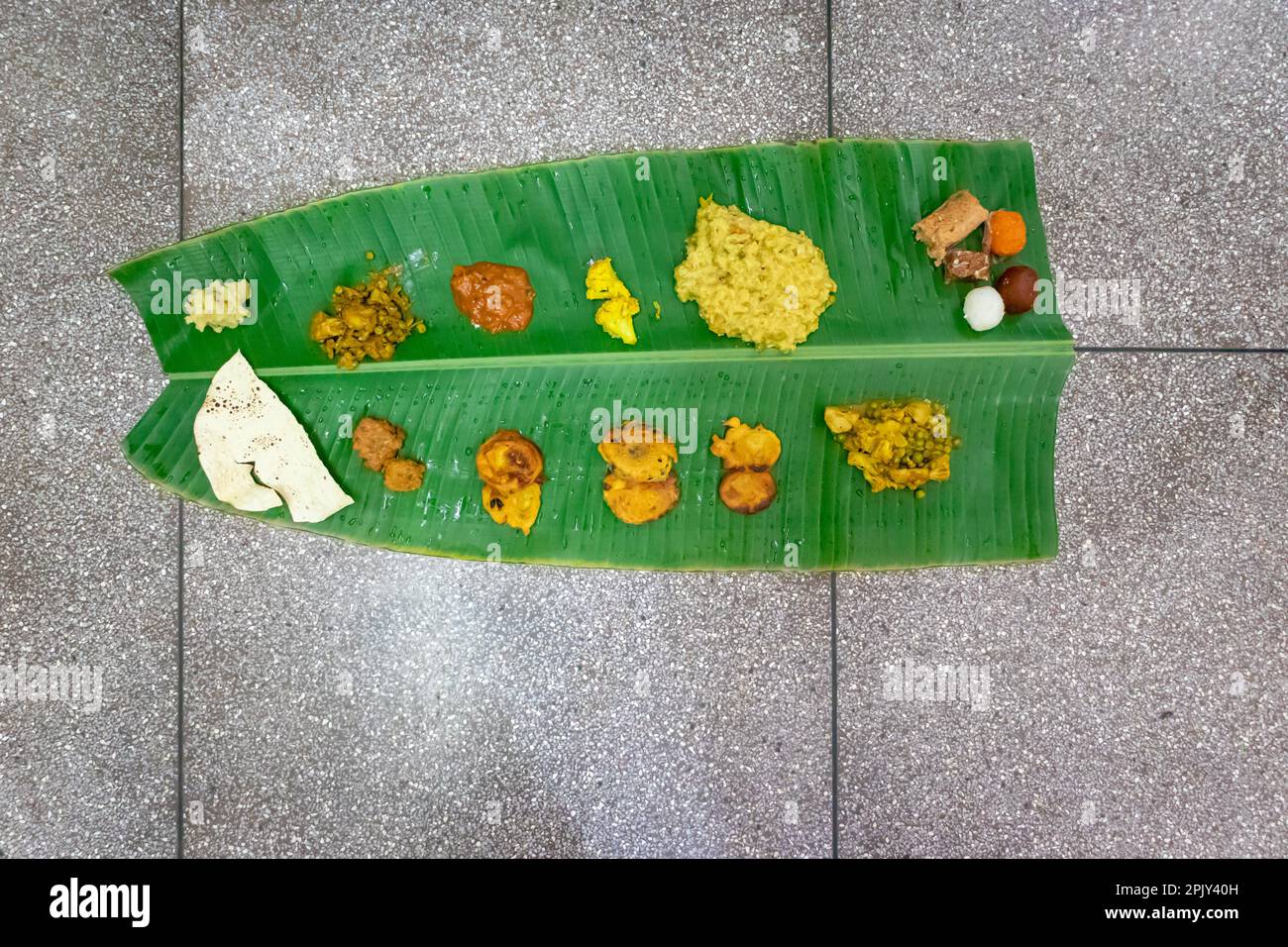 indian traditional mithila region food served at banana leaf at ...