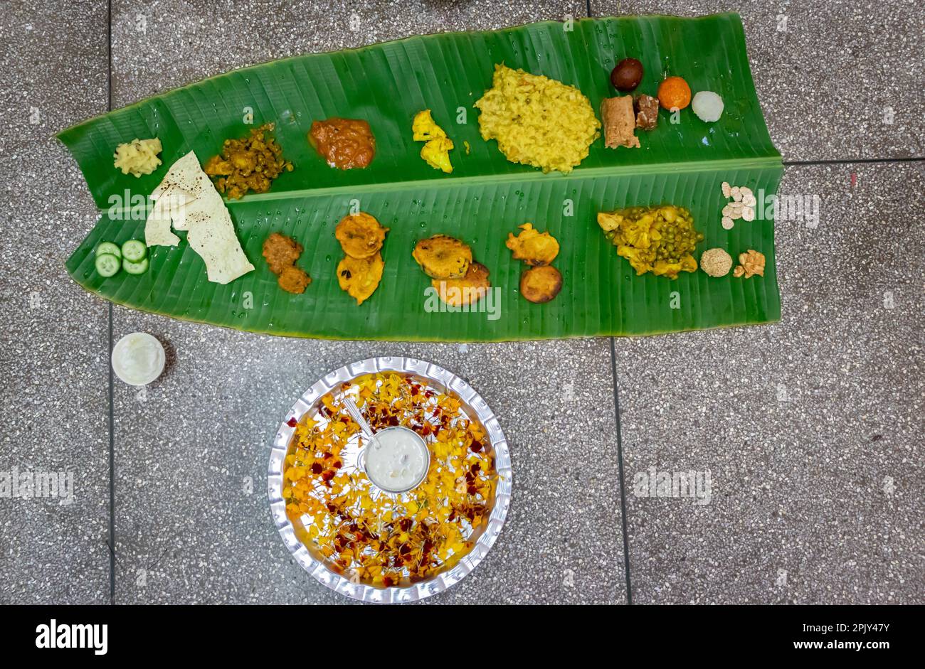 indian traditional mithila region food served at banana leaf at ...