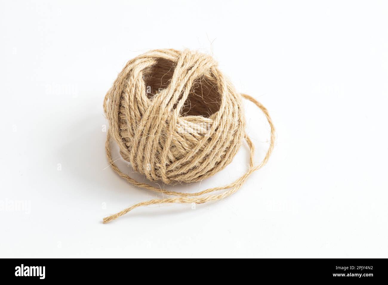 string on a white background Stock Photo - Alamy