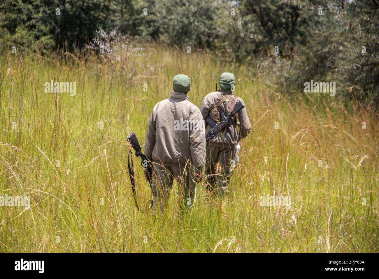 Rangers armed with guns in animal conservation park in Zimbabwe, in ...
