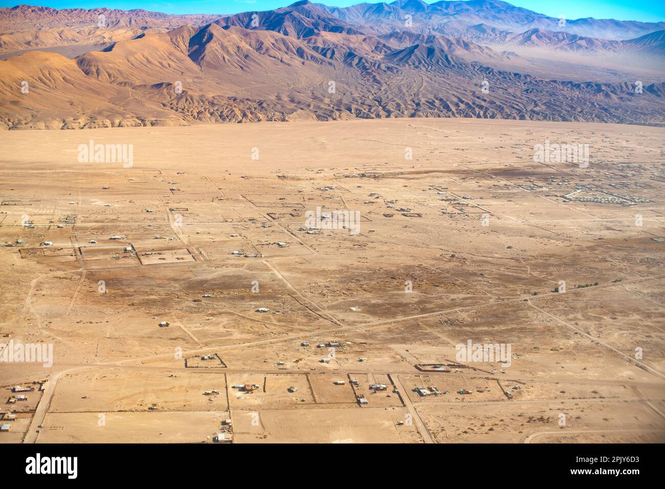 Aerial view of poor houses in the Atacama desert outside the city of ...