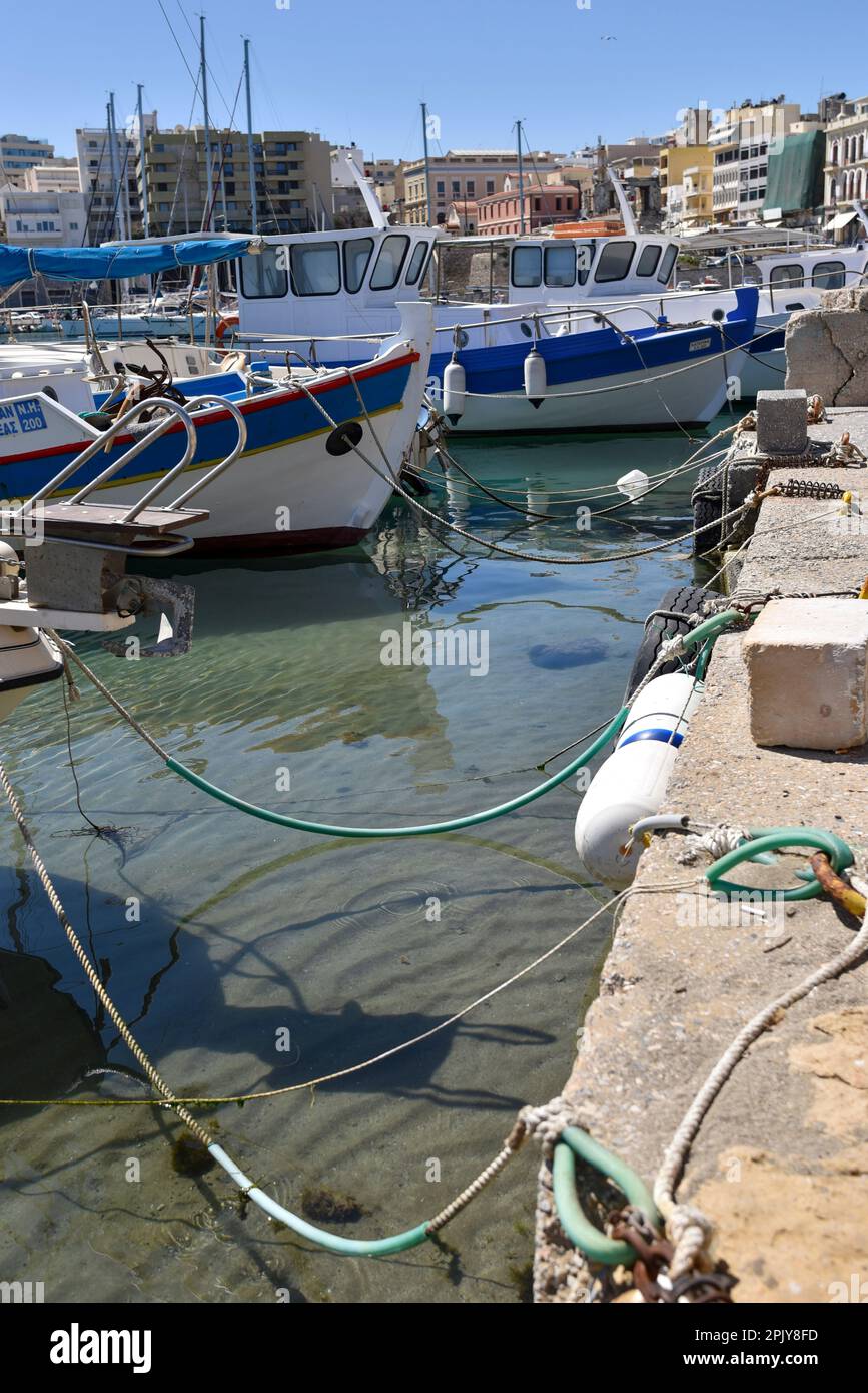 Heraklion harbour, small boats moored summer time, Crete, Greece Stock ...