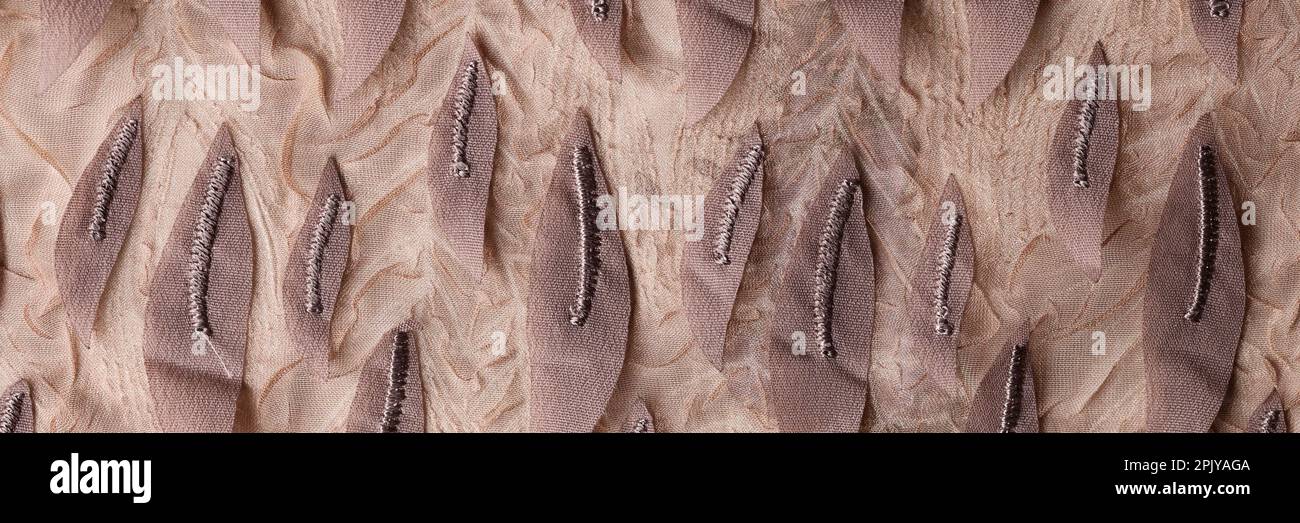 Fashion cloth decorated with fabric leaves texture background Stock ...