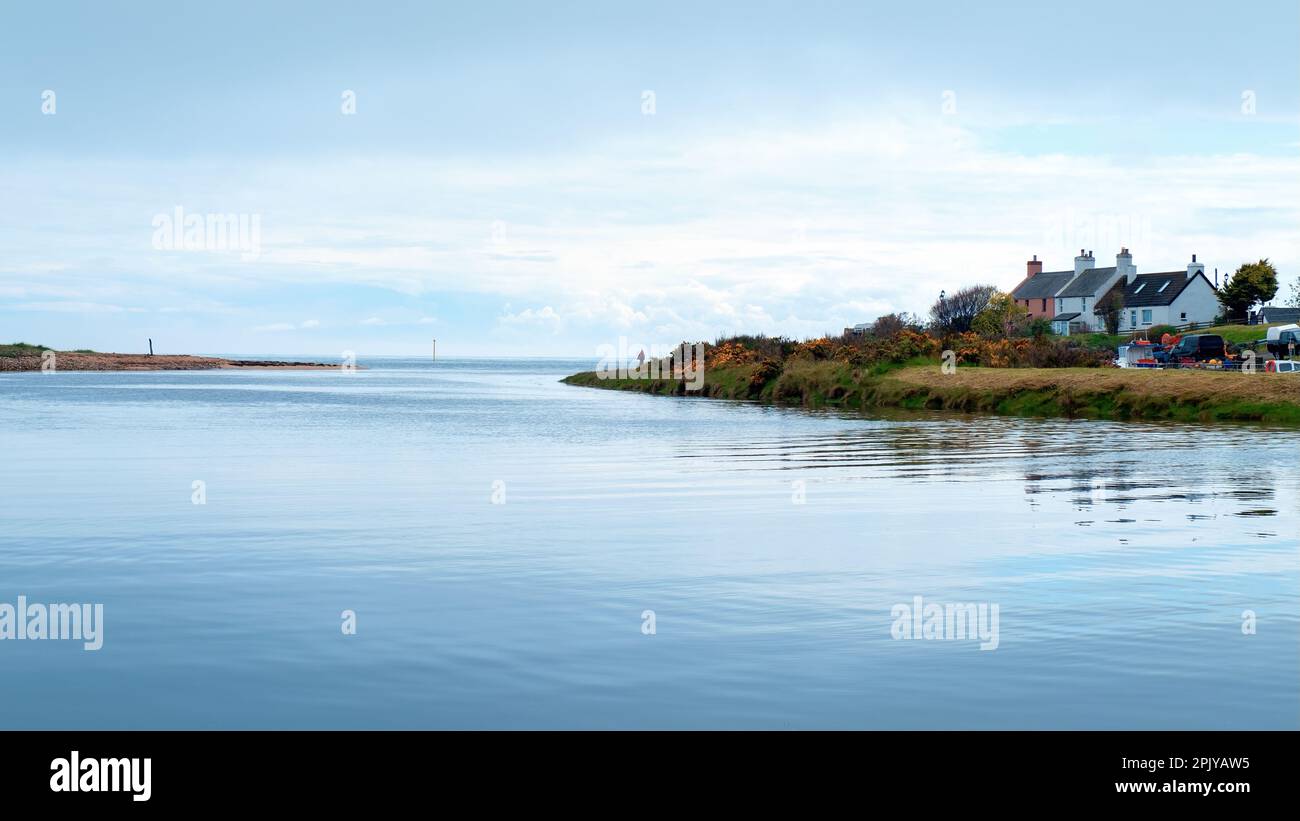 River Brora estuary at high tide looking across to Brora harbour Stock ...
