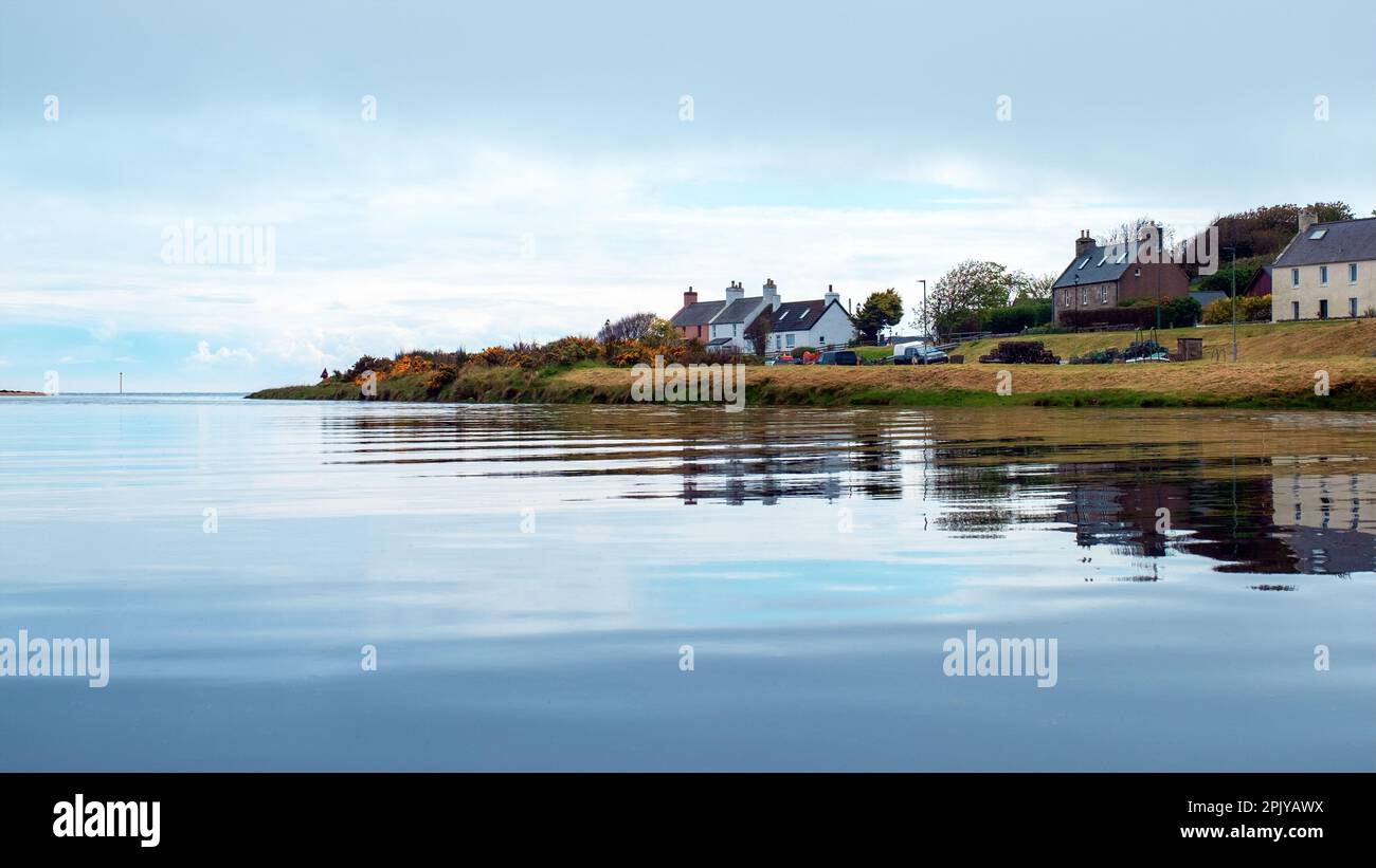 River Brora estuary at high tide looking across to Brora harbour Stock ...
