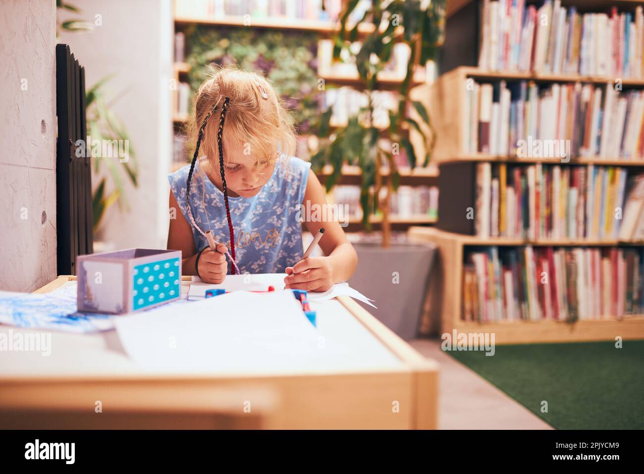 Schoolgirl doing homework. Elementary student learning, drawing ...