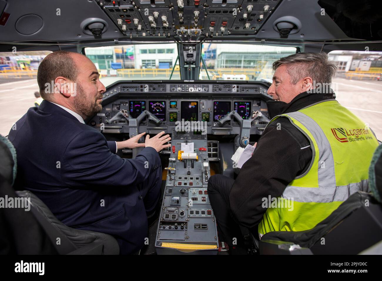 Transport Minister Richard Holden (left) speaking with Loganair Co ...
