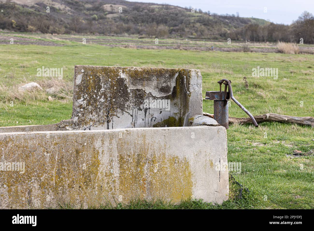 Old pump used to extract water from the field in Turkey. Retro well ...