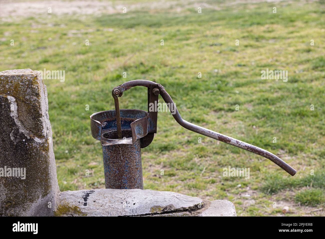 Old pump used to extract water from the field in Turkey. Retro well ...