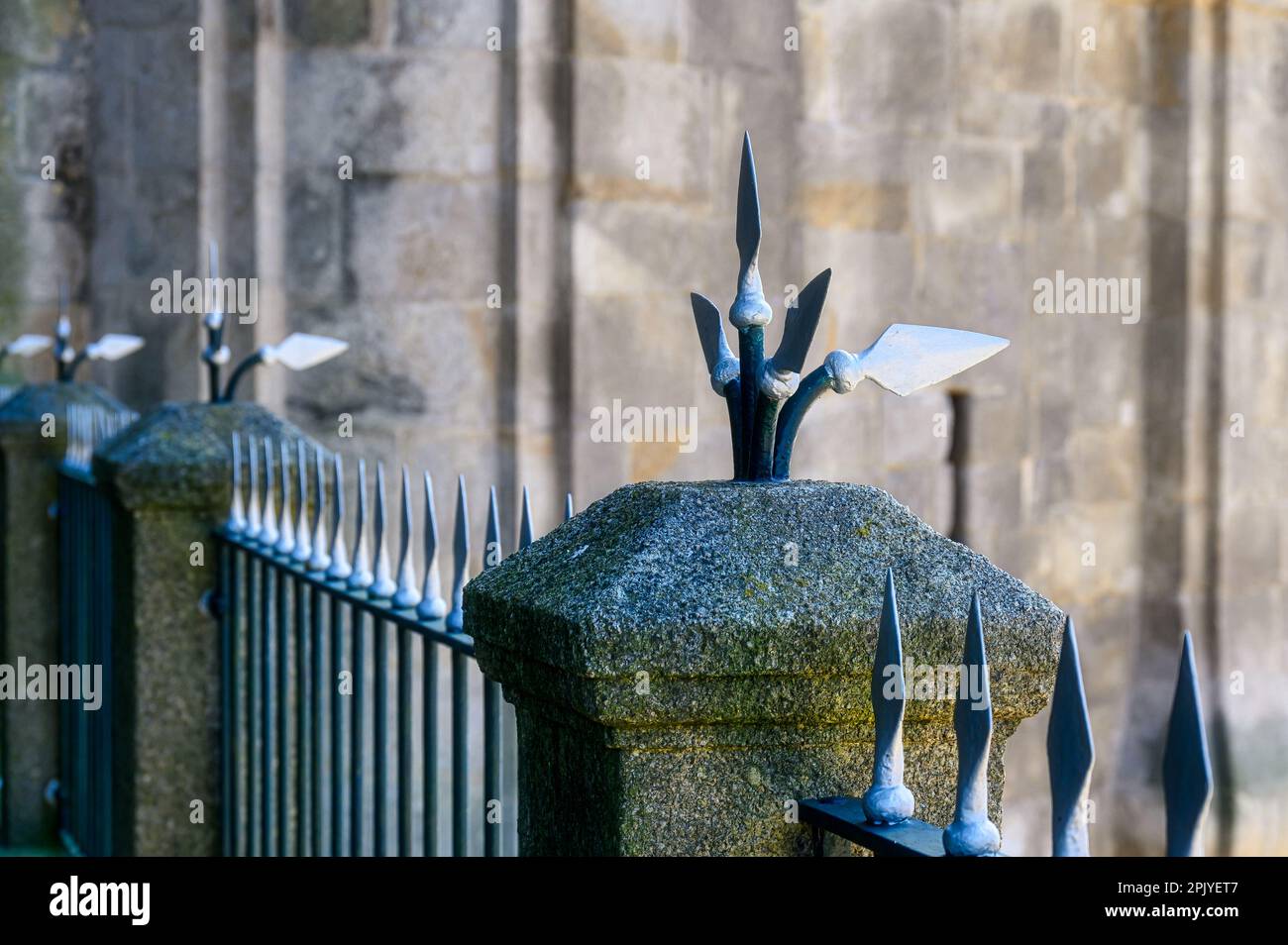 Metal safety feature on top of a stone column in the surrounding fence ...