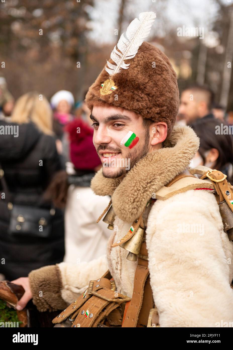 Young Kukeri dancer with intricate costume at a traditional annual ...