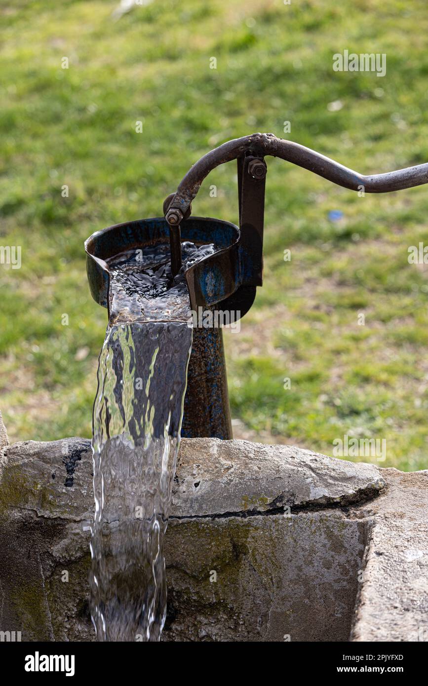 Old pump used to extract water from the field in Turkey. Retro well ...