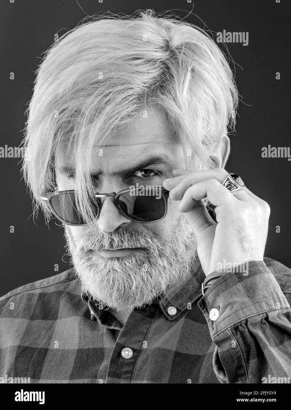 Handsome male model - beard mustache and blonde hairdo wears casual ...