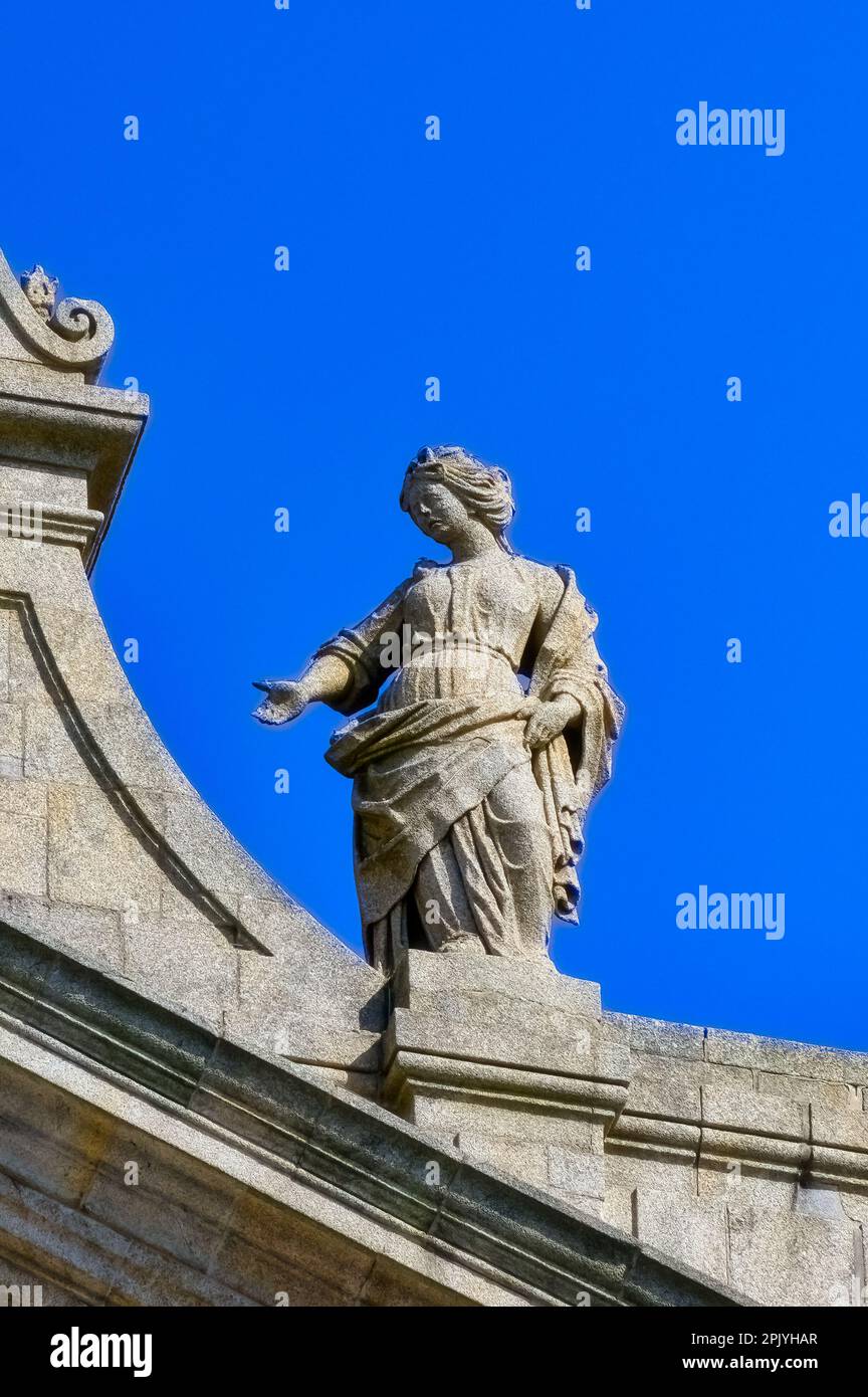 Close-up of decorative stone statue or sculptures in the facade. Also ...