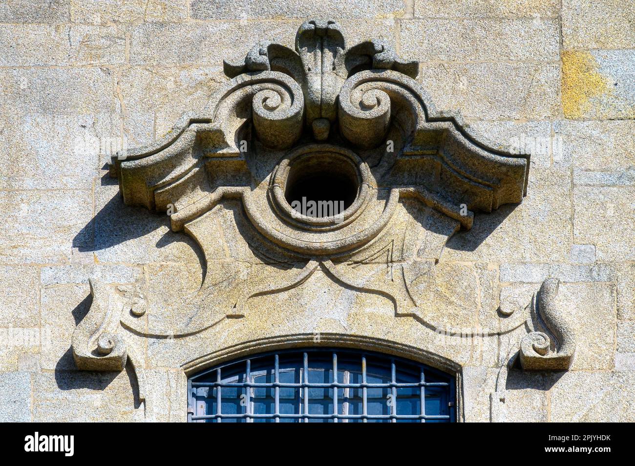 Close-up of stone decorations on top of a window. Also known as the ...