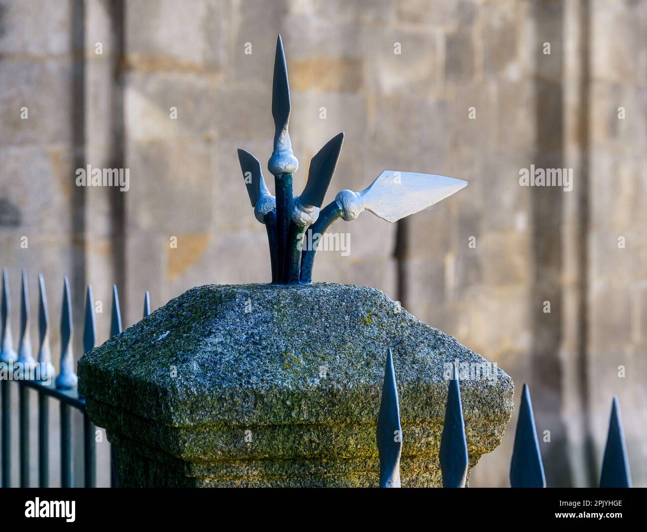Metal safety feature on top of a stone column in the surrounding fence ...