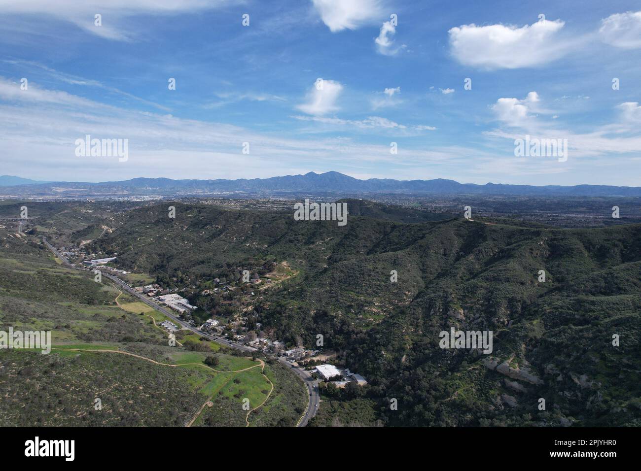 Aerial view of a small town, with houses and buildings spread out below ...