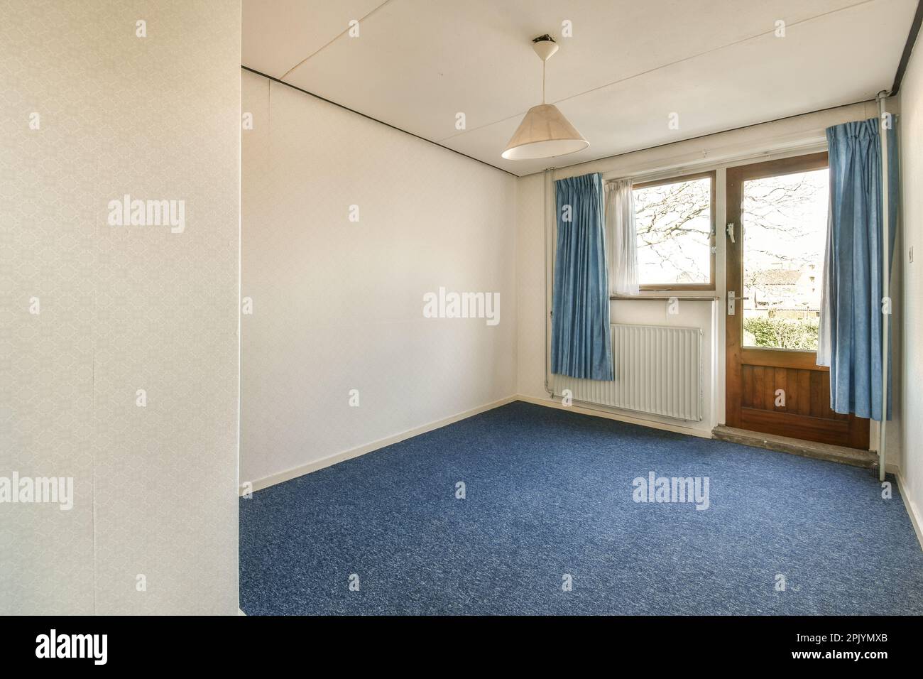 Empty Room With Window And Carpet