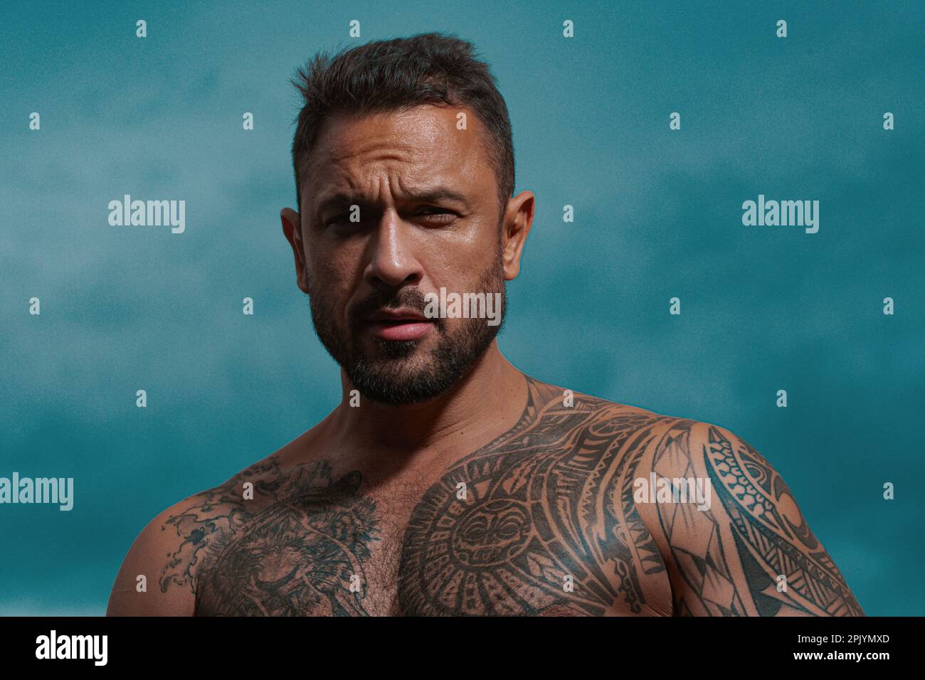 Brutal man, handsome serious male model. Close up portrait of guy with ...