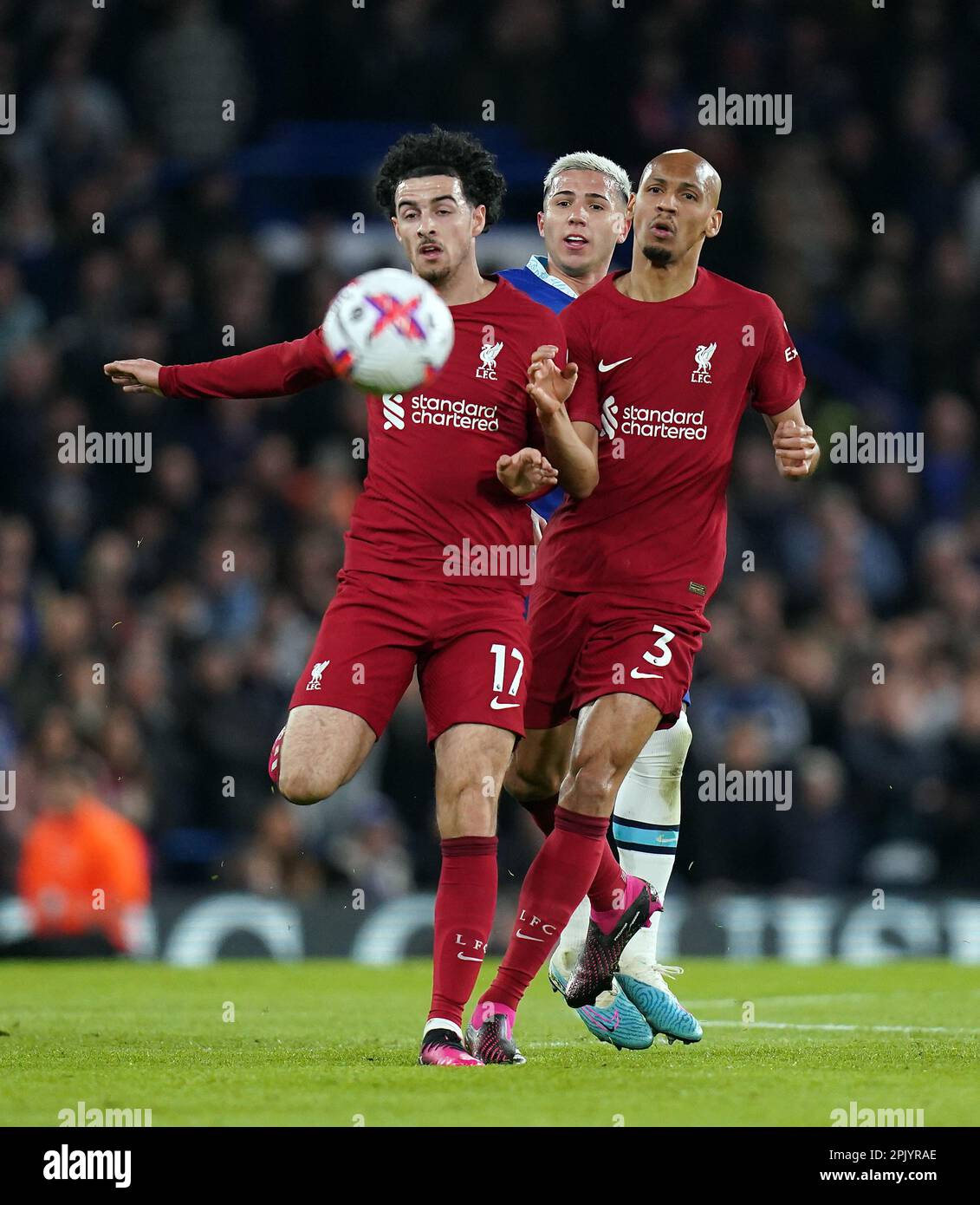 Chelsea's Enzo Fernandez with Liverpool's Curtis Jones (left) and ...