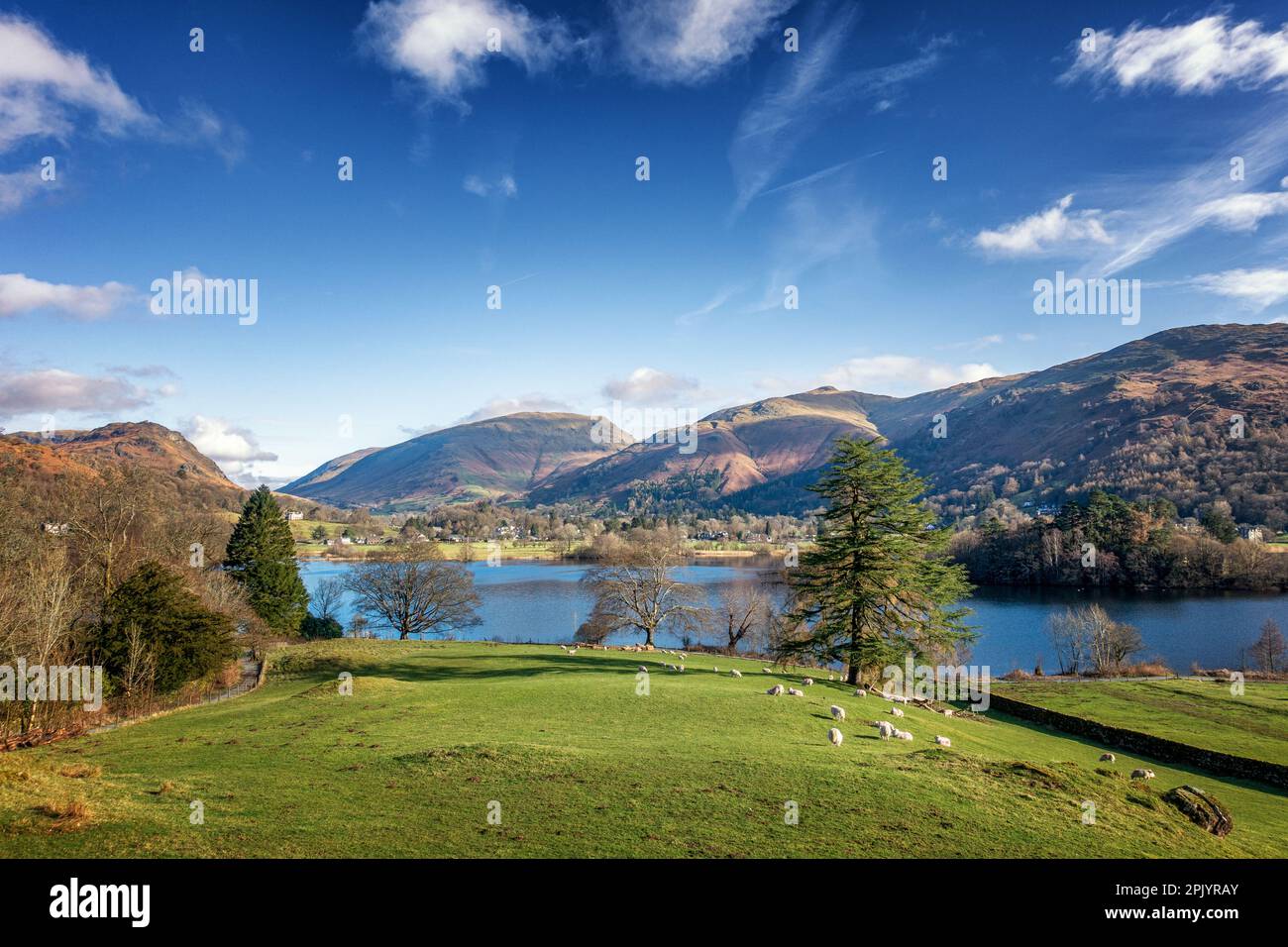 Stunning view across Grasmere with Fairfield mountain range in the ...