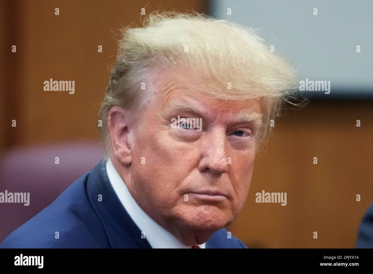 Former President Donald Trump appears in court for his arraignment ...
