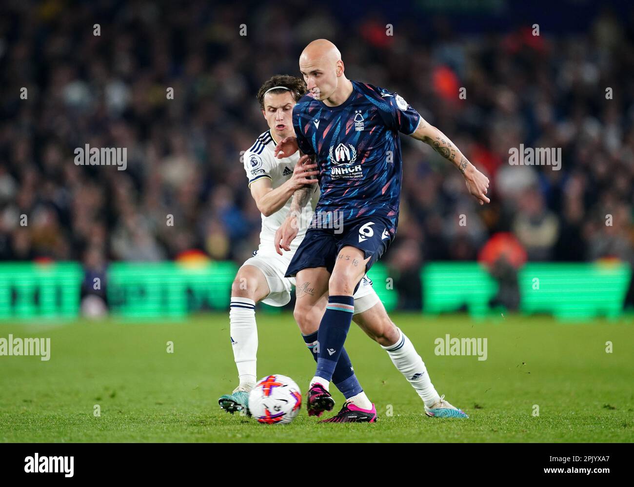 Leeds United's Brenden Aaronson (left) and Nottingham Forest's Jonjo ...