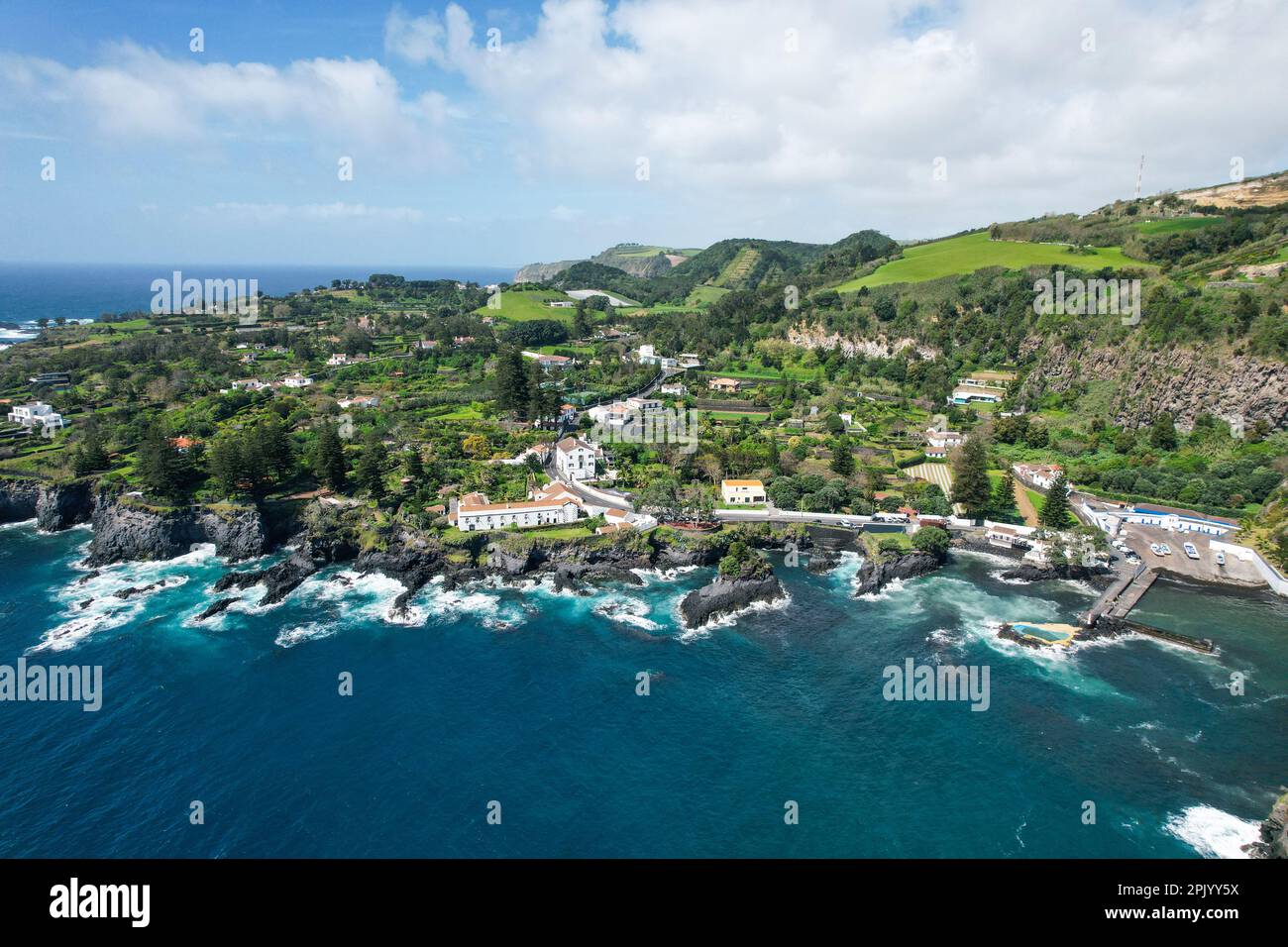 Drone view of the Caloura, a seaside fishing village with great views ...