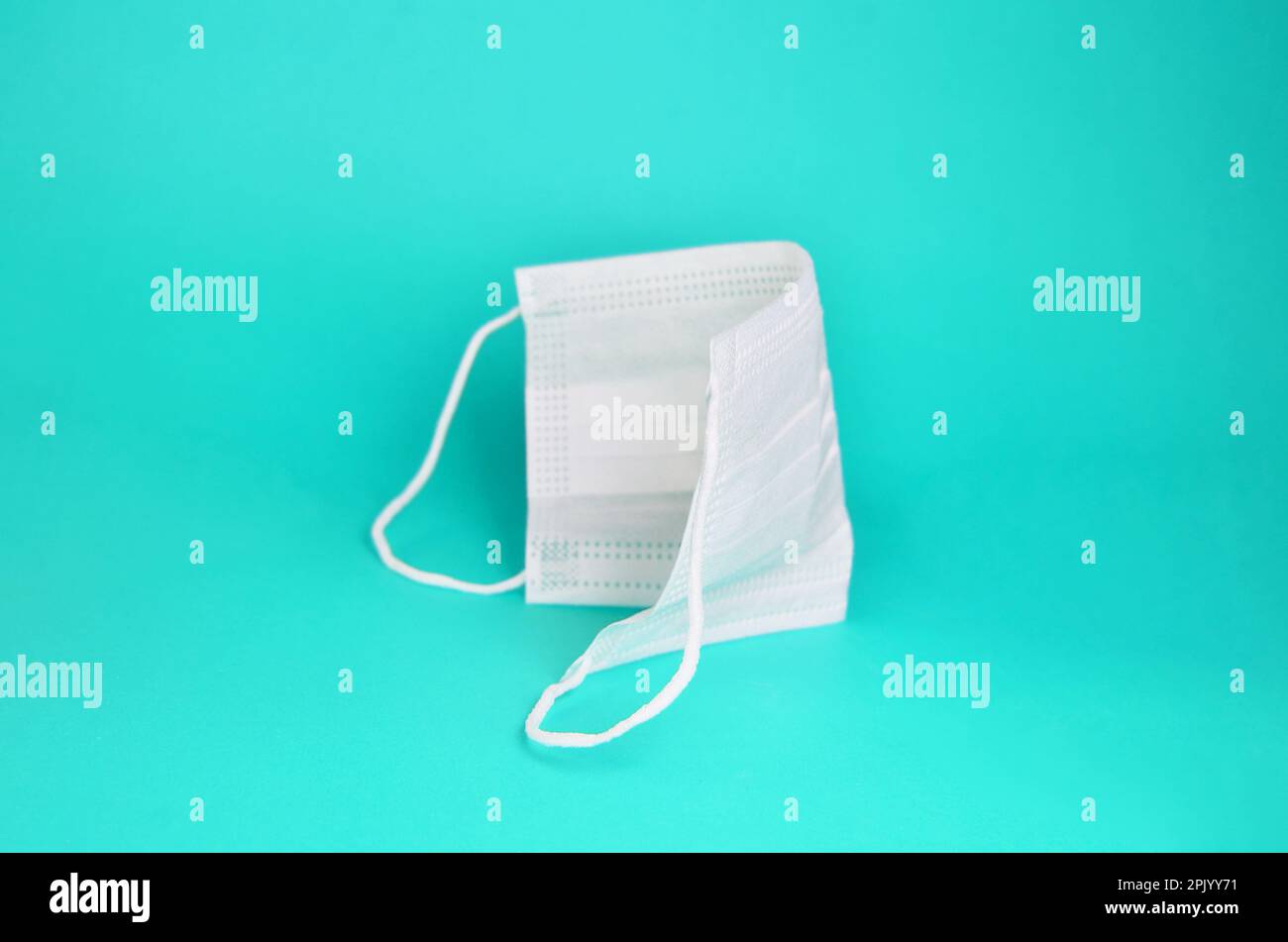 Surgical mask turquoise blue hi-res stock photography and images - Alamy