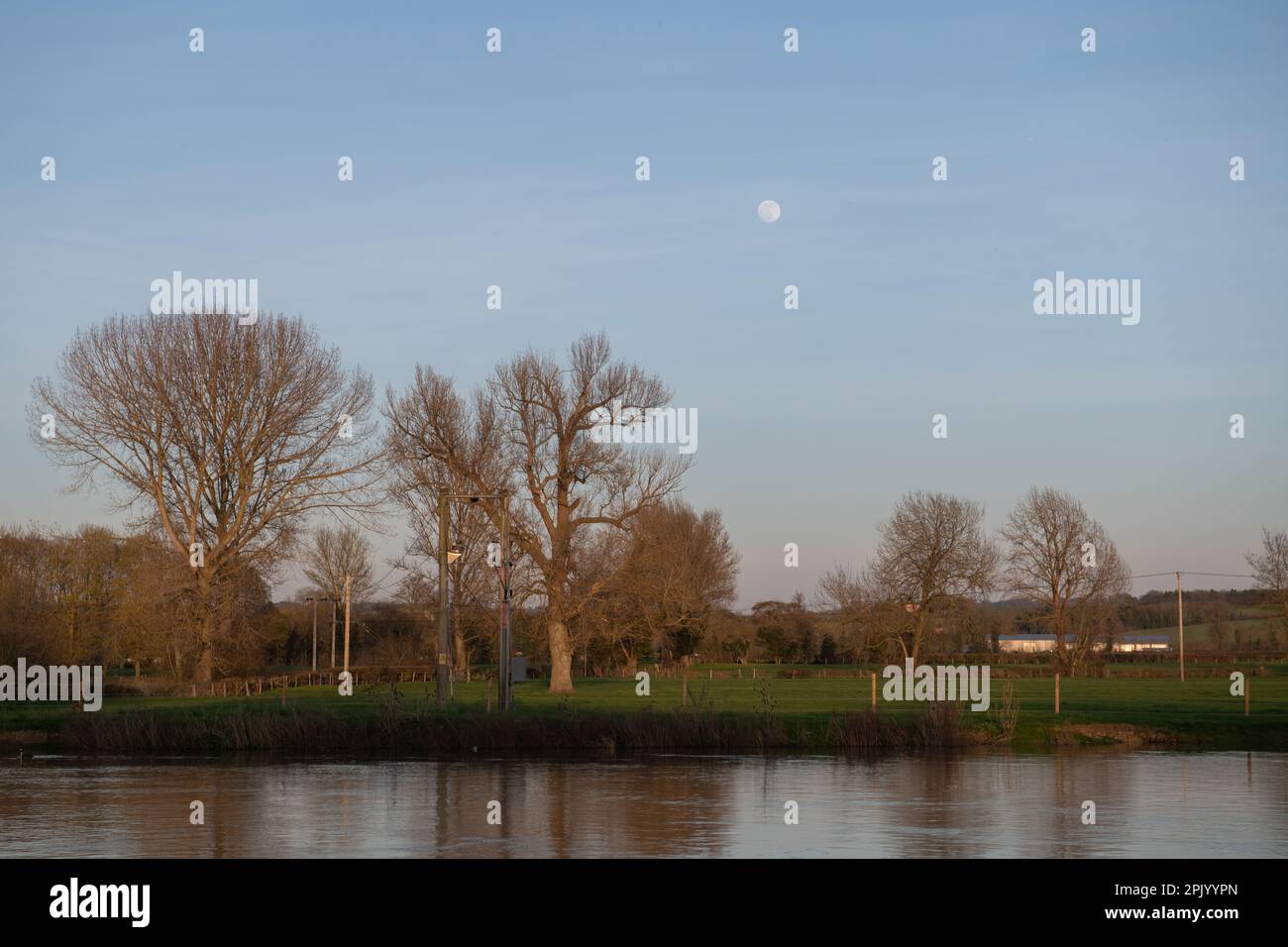 The Moon above the River Thames at Wallingford, Oxfordshire Stock Photo ...