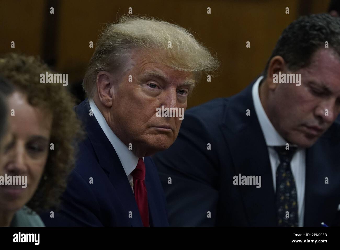 Former President Donald Trump appears in court for his arraignment ...