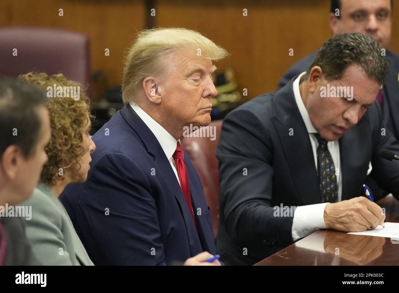 Former President Donald Trump appears in court for his arraignment ...