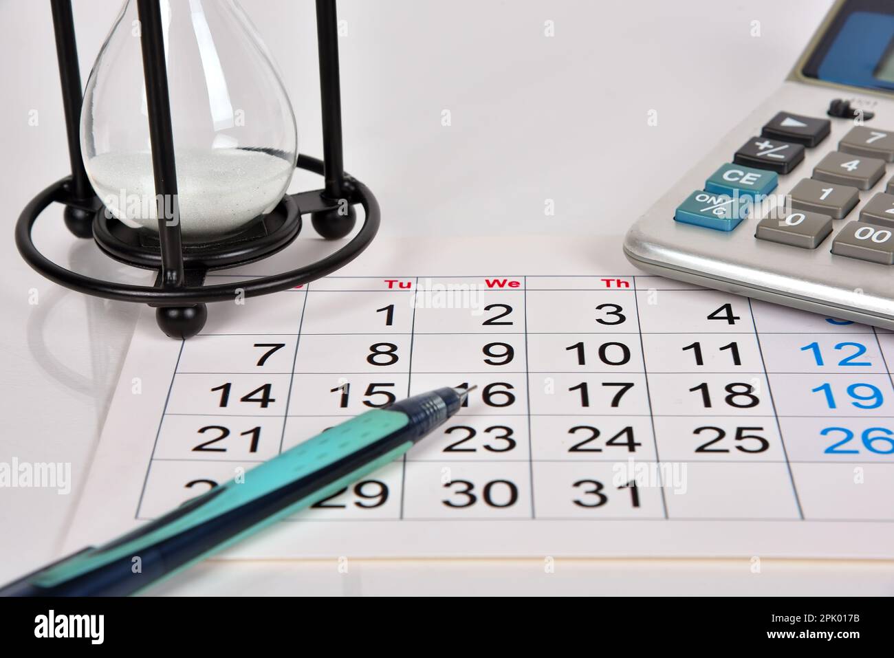 dates on calendar page on table, close up Stock Photo - Alamy